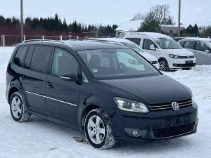 Black Volkswagen Touran 2011 in Kedainiai, with an engine capacity of 1.97 L and mileage of 255 thousand km for 6499 €, photo 2 on AUTOMOTO.COM.LV