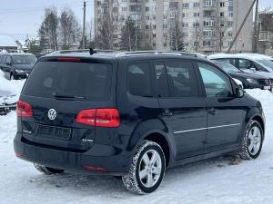 Black Volkswagen Touran 2011 in Kedainiai, with an engine capacity of 1.97 L and mileage of 255 thousand km for 6499 €, photo 3 on AUTOMOTO.COM.LV