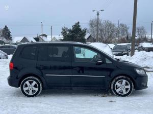 Black Volkswagen Touran 2011 in Kedainiai, with an engine capacity of 1.97 L and mileage of 255 thousand km for 6499 €, photo 5 on AUTOMOTO.COM.LV