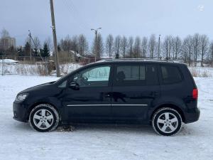 Black Volkswagen Touran 2011 in Kedainiai, with an engine capacity of 1.97 L and mileage of 255 thousand km for 6499 €, photo 6 on AUTOMOTO.COM.LV
