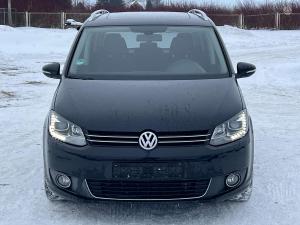 Black Volkswagen Touran 2011 in Kedainiai, with an engine capacity of 1.97 L and mileage of 255 thousand km for 6499 €, photo 7 on AUTOMOTO.COM.LV
