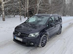 Black Volkswagen Touran 2011 in Vilnius, with an engine capacity of 1.60 L and mileage of 278 thousand km for 4350 €, photo 9 on AUTOMOTO.COM.LV