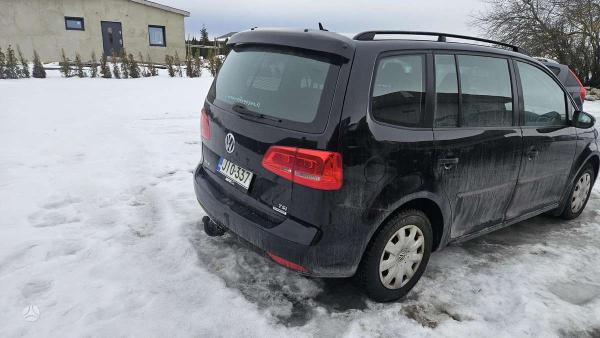 Melns Volkswagen Touran 2011 Marijampole, ar dzinēja tilpumu 1.20 L un nobraukumu 280 tūkst. km par 1999 €, foto 2 vietnē AUTOMOTO.COM.LV