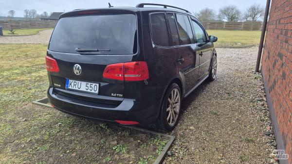Black Volkswagen Touran 2011 in Vilnius, with an engine capacity of 2.00 L and mileage of 423 thousand km for 6100 €, photo 5 on AUTOMOTO.COM.LV
