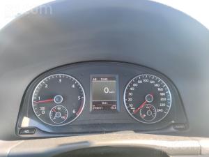 Black Volkswagen Touran 2011 in Riga, with an engine capacity of 2.00 L and mileage of 293 thousand km for 5490 €, photo 8 on AUTOMOTO.COM.LV