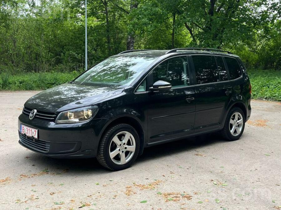 Melns Volkswagen Touran 2011 Rīga, ar dzinēja tilpumu 1.40 L un nobraukumu 0 tūkst. km par 4799 €, foto 1 vietnē AUTOMOTO.COM.LV