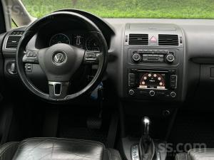 Melns Volkswagen Touran 2011 Rīga, ar dzinēja tilpumu 1.40 L un nobraukumu 0 tūkst. km par 4799 €, foto 12 vietnē AUTOMOTO.COM.LV