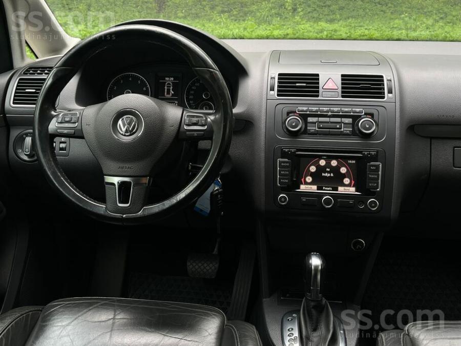 Melns Volkswagen Touran 2011 Rīga, ar dzinēja tilpumu 1.40 L un nobraukumu 0 tūkst. km par 4799 €, foto 12 vietnē AUTOMOTO.COM.LV
