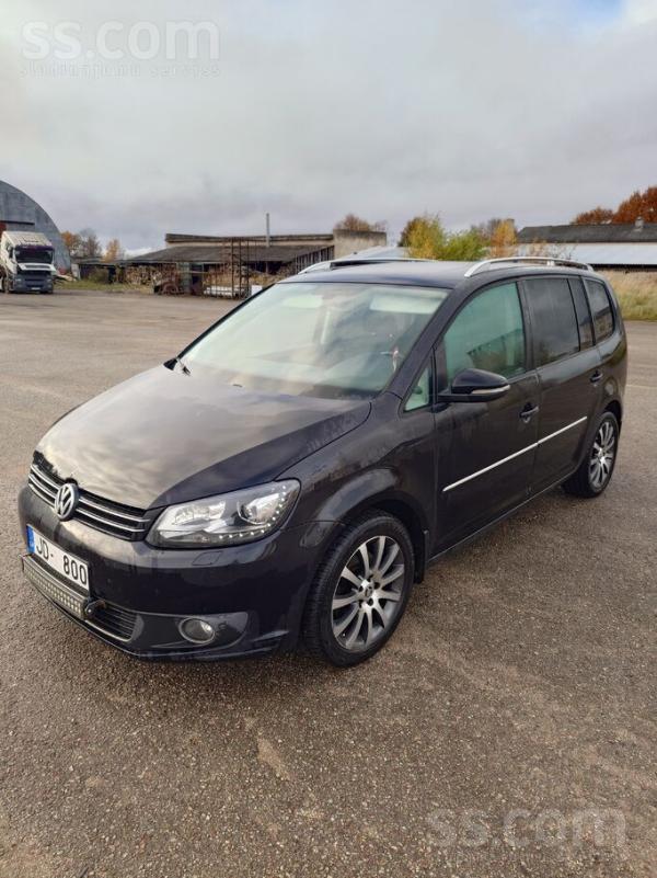 Black Volkswagen Touran 2011 in Talsi, with an engine capacity of 2.00 L and mileage of 356 thousand km for 3600 €, photo 1 on AUTOMOTO.COM.LV