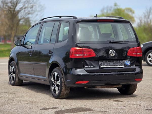 Melns Volkswagen Touran 2011 Liepāja, ar dzinēja tilpumu 1.20 L un nobraukumu 213 tūkst. km par 4750 €, foto 8 vietnē AUTOMOTO.COM.LV