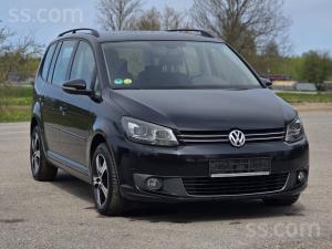 Black Volkswagen Touran 2011 in Liepaja, with an engine capacity of 1.20 L and mileage of 213 thousand km for 4750 €, photo 5 on AUTOMOTO.COM.LV