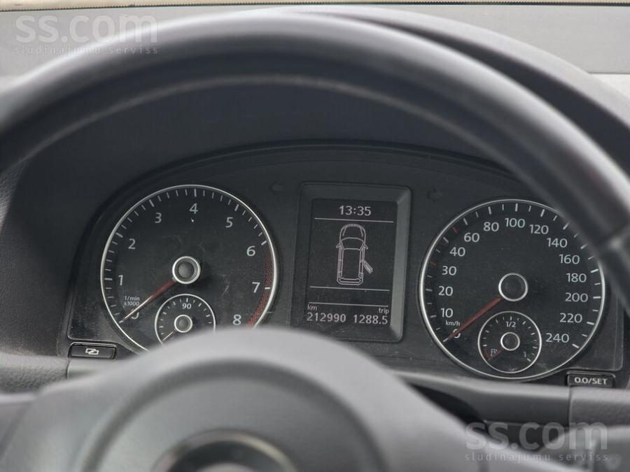Black Volkswagen Touran 2011 in Liepaja, with an engine capacity of 1.20 L and mileage of 213 thousand km for 4750 €, photo 21 on AUTOMOTO.COM.LV