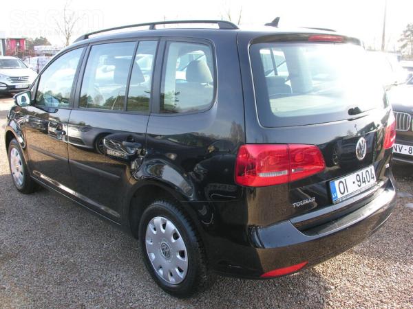 Melns Volkswagen Touran 2011 Rīga, ar dzinēja tilpumu 1.40 L un nobraukumu 0 tūkst. km par 5100 €, foto 4 vietnē AUTOMOTO.COM.LV