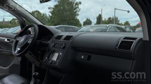 Melns Volkswagen Touran 2011 Rīga, ar dzinēja tilpumu 1.60 L un nobraukumu 242 tūkst. km par 7490 €, foto 9 vietnē AUTOMOTO.COM.LV