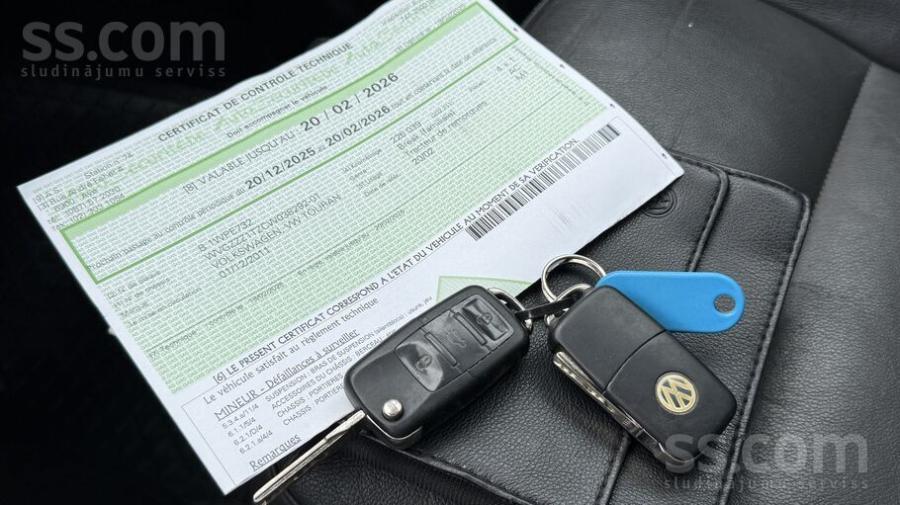 Melns Volkswagen Touran 2011 Rīga, ar dzinēja tilpumu 1.60 L un nobraukumu 242 tūkst. km par 7490 €, foto 15 vietnē AUTOMOTO.COM.LV