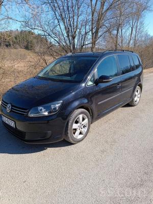 Black Volkswagen Touran 2011 in Kraslava, with an engine capacity of 1.60 L and mileage of 300 thousand km for 5250 €, photo 7 on AUTOMOTO.COM.LV