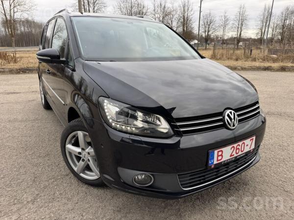 Melns Volkswagen Touran 2011 Ogre, ar dzinēja tilpumu 2.00 L un nobraukumu 222 tūkst. km par 7500 €, foto 2 vietnē AUTOMOTO.COM.LV