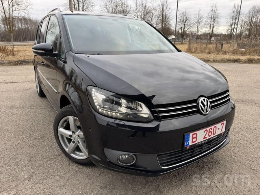 Melns Volkswagen Touran 2011 Ogre, ar dzinēja tilpumu 2.00 L un nobraukumu 222 tūkst. km par 7500 €, foto 3 vietnē AUTOMOTO.COM.LV