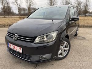 Melns Volkswagen Touran 2011 Ogre, ar dzinēja tilpumu 2.00 L un nobraukumu 222 tūkst. km par 7500 €, foto 4 vietnē AUTOMOTO.COM.LV