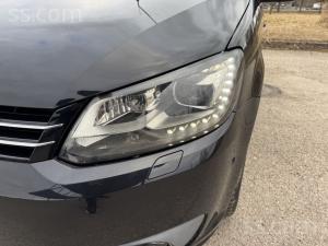Melns Volkswagen Touran 2011 Ogre, ar dzinēja tilpumu 2.00 L un nobraukumu 222 tūkst. km par 7500 €, foto 6 vietnē AUTOMOTO.COM.LV