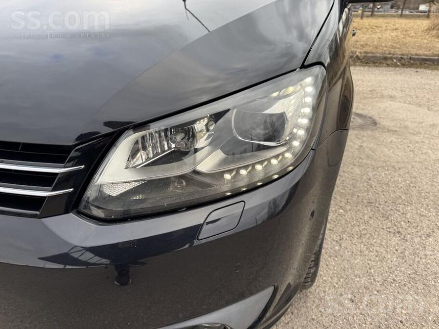 Melns Volkswagen Touran 2011 Ogre, ar dzinēja tilpumu 2.00 L un nobraukumu 222 tūkst. km par 7500 €, foto 6 vietnē AUTOMOTO.COM.LV