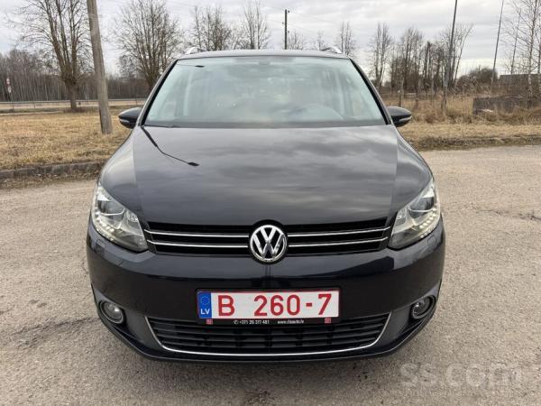 Melns Volkswagen Touran 2011 Ogre, ar dzinēja tilpumu 2.00 L un nobraukumu 222 tūkst. km par 7500 €, foto 6 vietnē AUTOMOTO.COM.LV