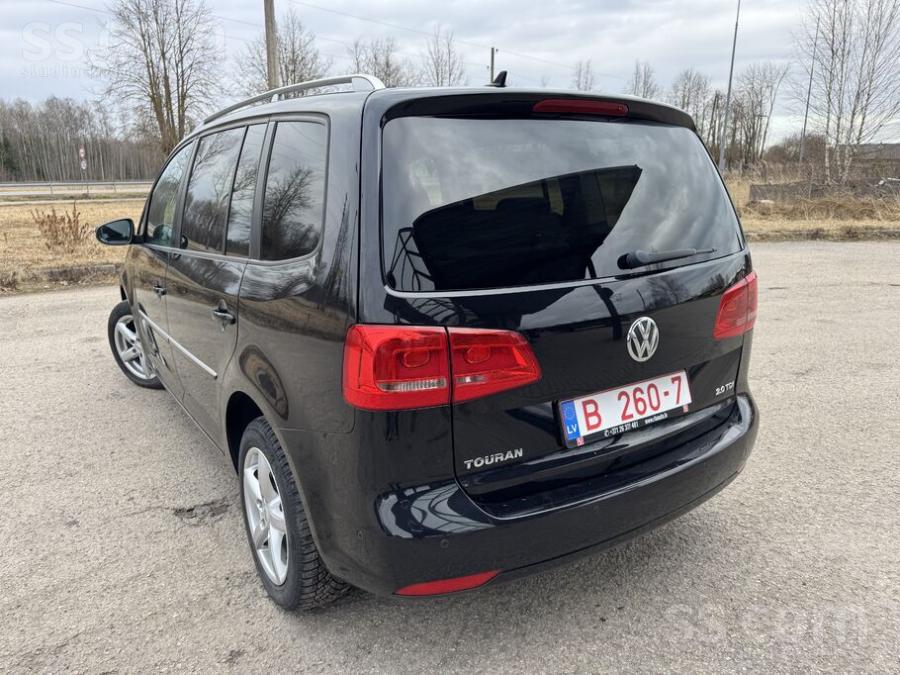 Melns Volkswagen Touran 2011 Ogre, ar dzinēja tilpumu 2.00 L un nobraukumu 222 tūkst. km par 7500 €, foto 8 vietnē AUTOMOTO.COM.LV