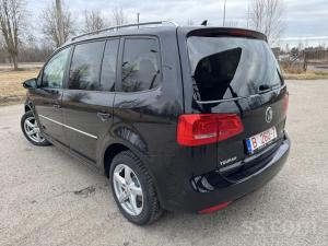 Melns Volkswagen Touran 2011 Ogre, ar dzinēja tilpumu 2.00 L un nobraukumu 222 tūkst. km par 7500 €, foto 9 vietnē AUTOMOTO.COM.LV