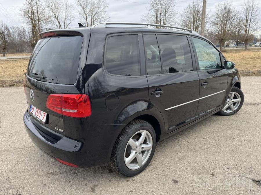 Melns Volkswagen Touran 2011 Ogre, ar dzinēja tilpumu 2.00 L un nobraukumu 222 tūkst. km par 7500 €, foto 10 vietnē AUTOMOTO.COM.LV