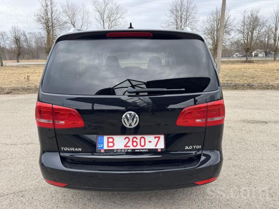 Melns Volkswagen Touran 2011 Ogre, ar dzinēja tilpumu 2.00 L un nobraukumu 222 tūkst. km par 7500 €, foto 11 vietnē AUTOMOTO.COM.LV