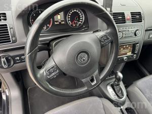 Melns Volkswagen Touran 2011 Ogre, ar dzinēja tilpumu 2.00 L un nobraukumu 222 tūkst. km par 7500 €, foto 19 vietnē AUTOMOTO.COM.LV