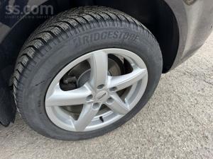 Melns Volkswagen Touran 2011 Ogre, ar dzinēja tilpumu 2.00 L un nobraukumu 222 tūkst. km par 7500 €, foto 25 vietnē AUTOMOTO.COM.LV
