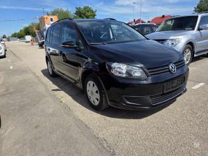 Black Volkswagen Touran 2011 in Siauliai, with an engine capacity of 1.60 L and mileage of 223 thousand km for 4500 €, photo 4 on AUTOMOTO.COM.LV