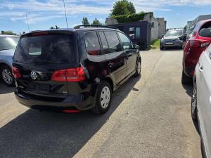 Black Volkswagen Touran 2011 in Siauliai, with an engine capacity of 1.60 L and mileage of 223 thousand km for 4500 €, photo 5 on AUTOMOTO.COM.LV