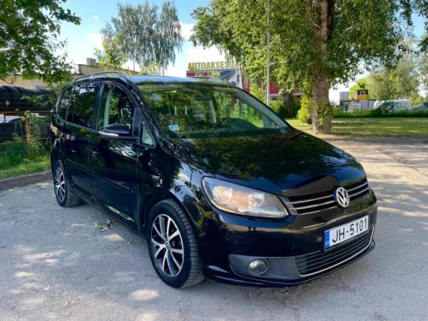 Black Volkswagen Touran 2011 in Riga, with an engine capacity of 1.60 L and mileage of 0 thousand km for 4800 €, photo 3 on AUTOMOTO.COM.LV