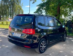 Melns Volkswagen Touran 2011 Rīga, ar dzinēja tilpumu 1.60 L un nobraukumu 0 tūkst. km par 4800 €, foto 6 vietnē AUTOMOTO.COM.LV