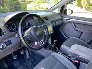 Melns Volkswagen Touran 2011 Rīga, ar dzinēja tilpumu 1.60 L un nobraukumu 0 tūkst. km par 4800 €, foto 7 vietnē AUTOMOTO.COM.LV