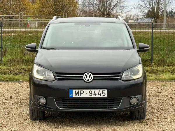 Black Volkswagen Touran 2011 in Jelgava, with an engine capacity of 2.00 L and mileage of 29 thousand km for 5900 €, photo 2 on AUTOMOTO.COM.LV
