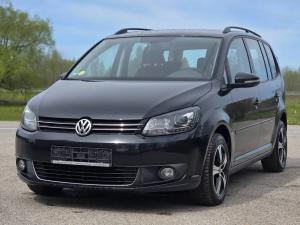 Melns Volkswagen Touran 2011 Grobiņa, ar dzinēja tilpumu 1.20 L un nobraukumu 213 tūkst. km par 4750 €, foto  vietnē AUTOMOTO.COM.LV