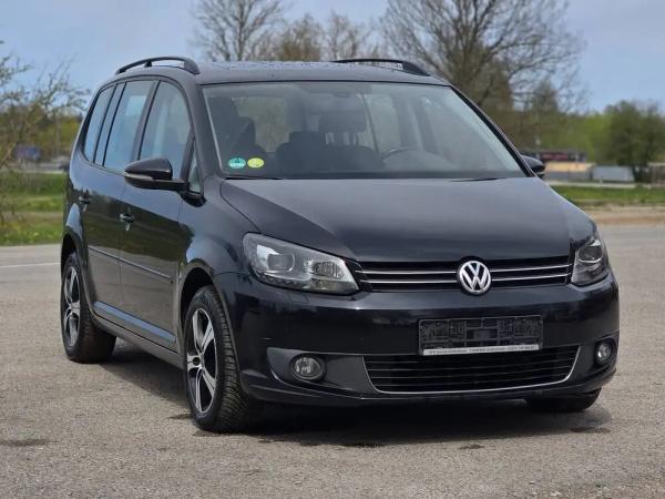 Melns Volkswagen Touran 2011 Grobiņa, ar dzinēja tilpumu 1.20 L un nobraukumu 213 tūkst. km par 4750 €, foto 4 vietnē AUTOMOTO.COM.LV