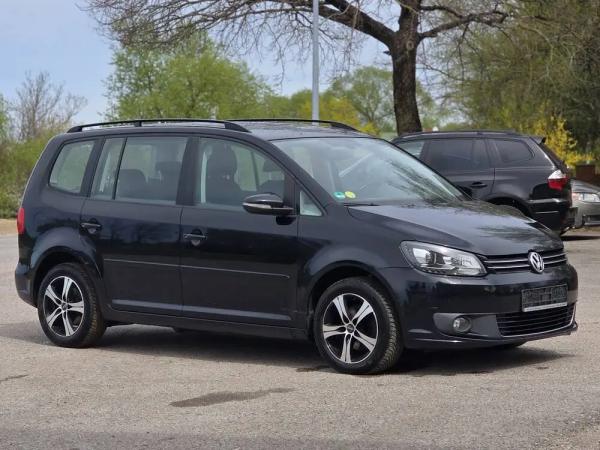Melns Volkswagen Touran 2011 Grobiņa, ar dzinēja tilpumu 1.20 L un nobraukumu 213 tūkst. km par 4750 €, foto 5 vietnē AUTOMOTO.COM.LV