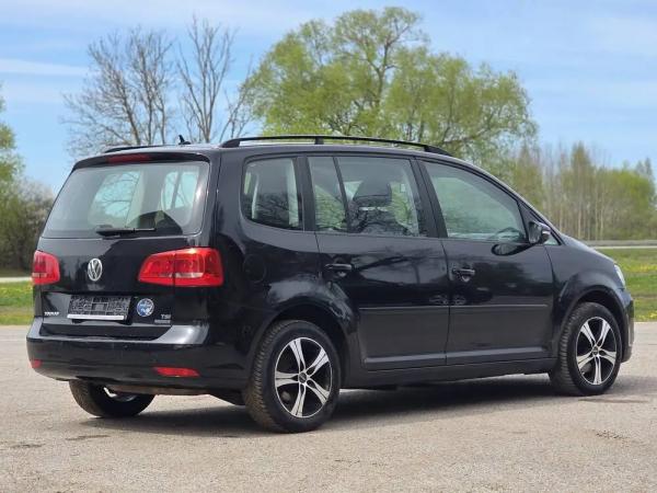 Melns Volkswagen Touran 2011 Grobiņa, ar dzinēja tilpumu 1.20 L un nobraukumu 213 tūkst. km par 4750 €, foto 6 vietnē AUTOMOTO.COM.LV