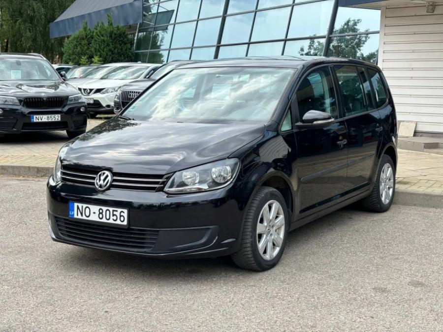 Black Volkswagen Touran 2011 in Riga, with an engine capacity of 1.60 L and mileage of 245 thousand km for 6950 €, photo 5 on AUTOMOTO.COM.LV