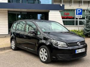 Black Volkswagen Touran 2011 in Riga, with an engine capacity of 1.60 L and mileage of 245 thousand km for 6950 €, photo 6 on AUTOMOTO.COM.LV