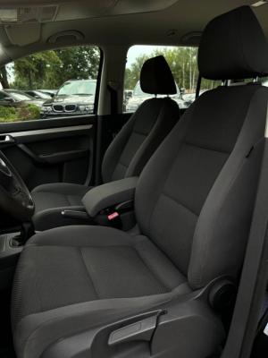 Black Volkswagen Touran 2011 in Riga, with an engine capacity of 1.60 L and mileage of 245 thousand km for 6950 €, photo 9 on AUTOMOTO.COM.LV