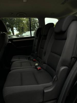 Black Volkswagen Touran 2011 in Riga, with an engine capacity of 1.60 L and mileage of 245 thousand km for 6950 €, photo 10 on AUTOMOTO.COM.LV