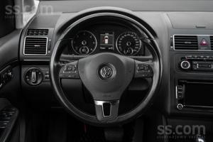 Black Volkswagen Touran 2011 in Riga, with an engine capacity of 2.00 L and mileage of 319 thousand km for 5490 €, photo 18 on AUTOMOTO.COM.LV