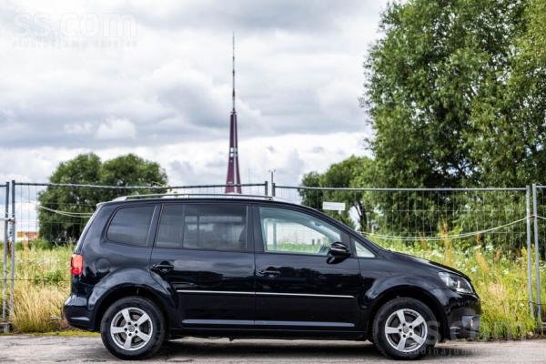 Melns Volkswagen Touran 2011 Rīga, ar dzinēja tilpumu 1.20 L un nobraukumu 304 tūkst. km par 5690 €, foto 5 vietnē AUTOMOTO.COM.LV