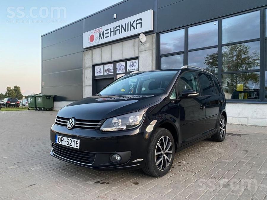 Melns Volkswagen Touran 2011 Cēsis, ar dzinēja tilpumu 1.60 L un nobraukumu 283 tūkst. km par 6600 €, foto 1 vietnē AUTOMOTO.COM.LV