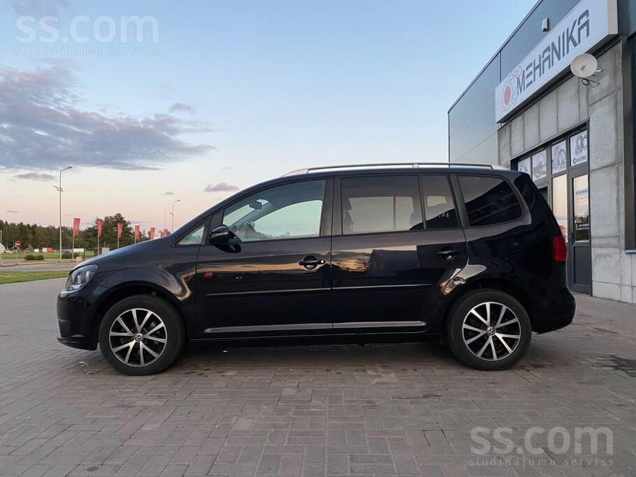Melns Volkswagen Touran 2011 Cēsis, ar dzinēja tilpumu 1.60 L un nobraukumu 283 tūkst. km par 6600 €, foto 12 vietnē AUTOMOTO.COM.LV